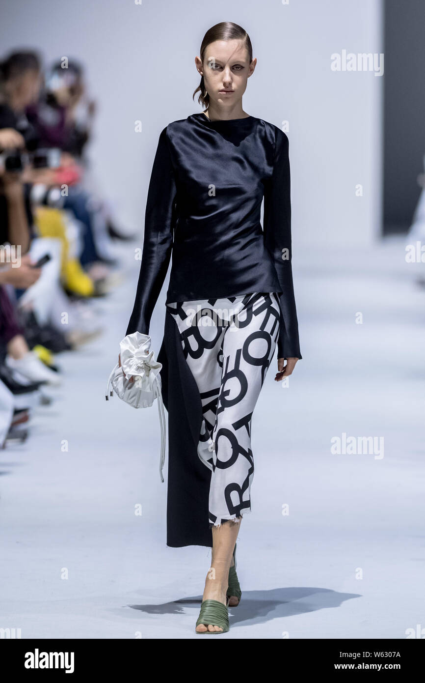 A model displays a new creation at the fashion show of IMMI during the ...