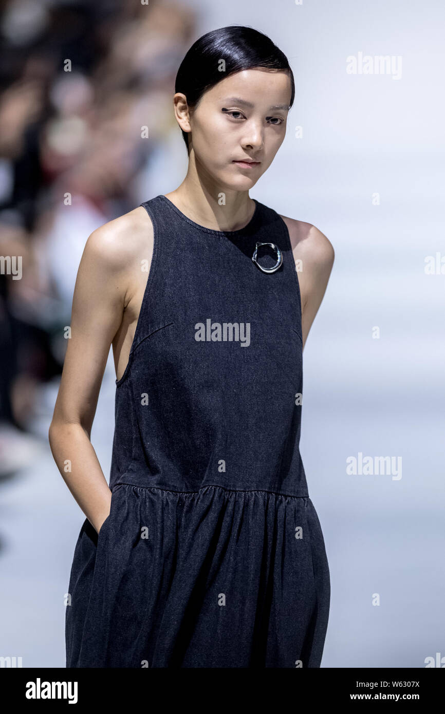 Chinese model Pei Bei displays a new creation at the fashion show of ...