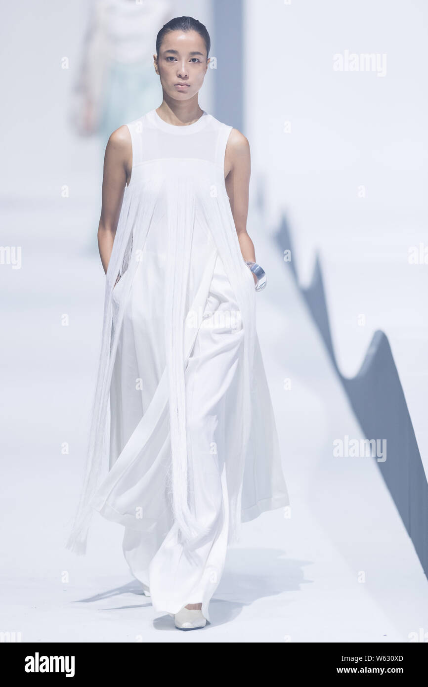 A model displays a new creation at the fashion show of IMM during the ...