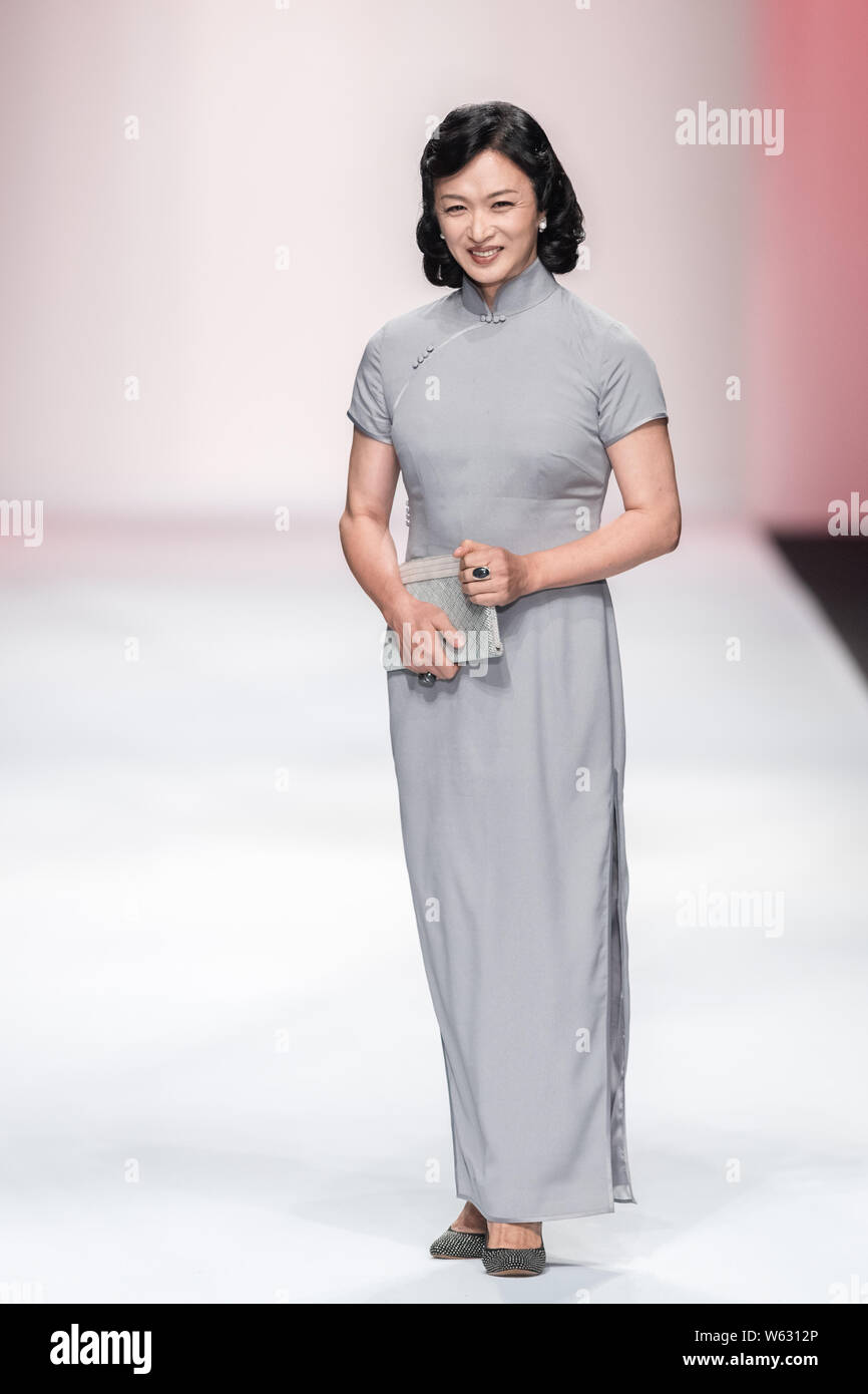 Chinese dancer Jin Xing displays a new creation at the fashion show of ...