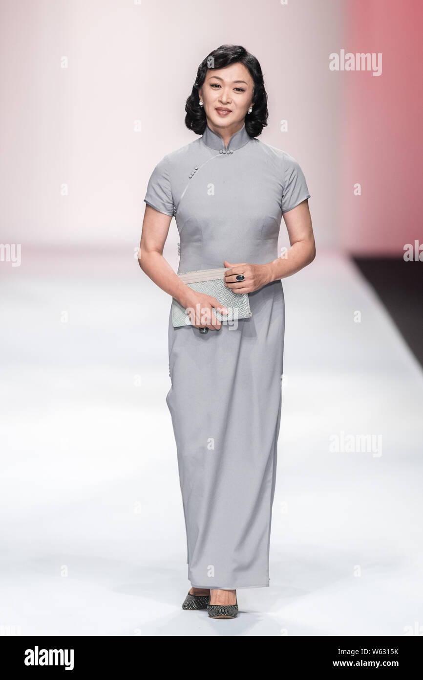 Chinese dancer Jin Xing displays a new creation at the fashion show of ...