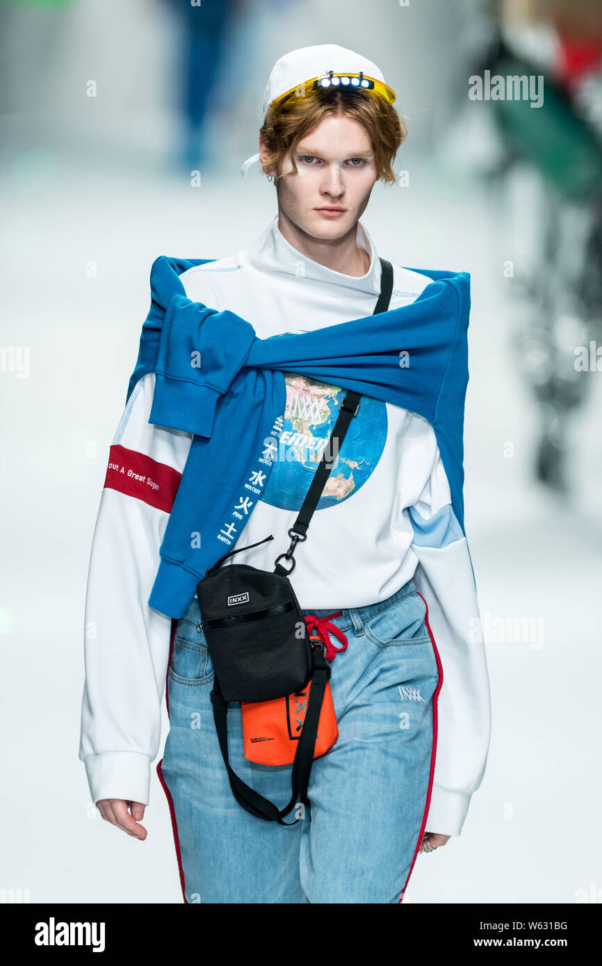 A model displays a new creation at the fashion show of INXX during the ...