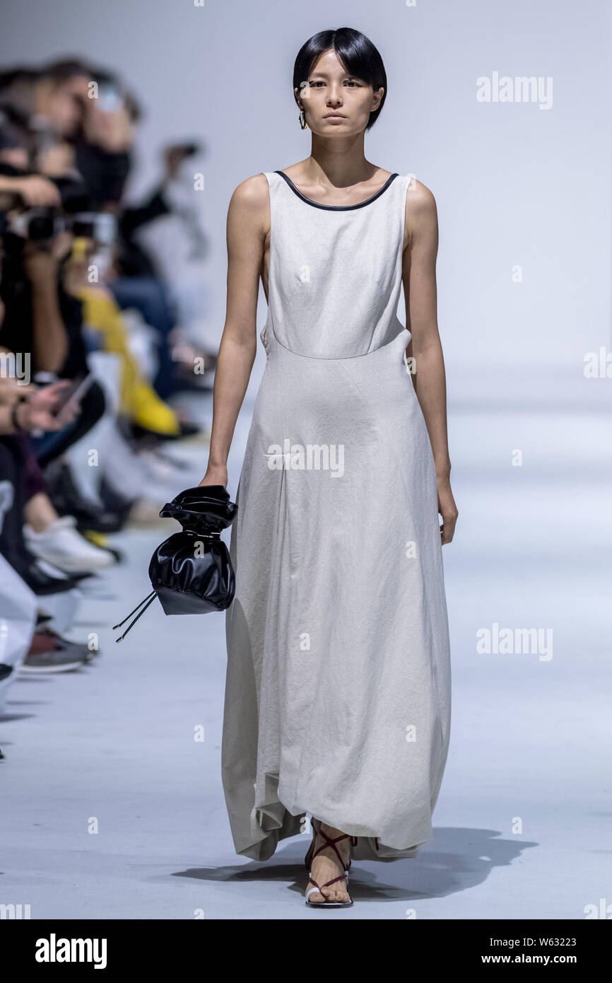 A model displays a new creation at the fashion show of IMMI during the ...