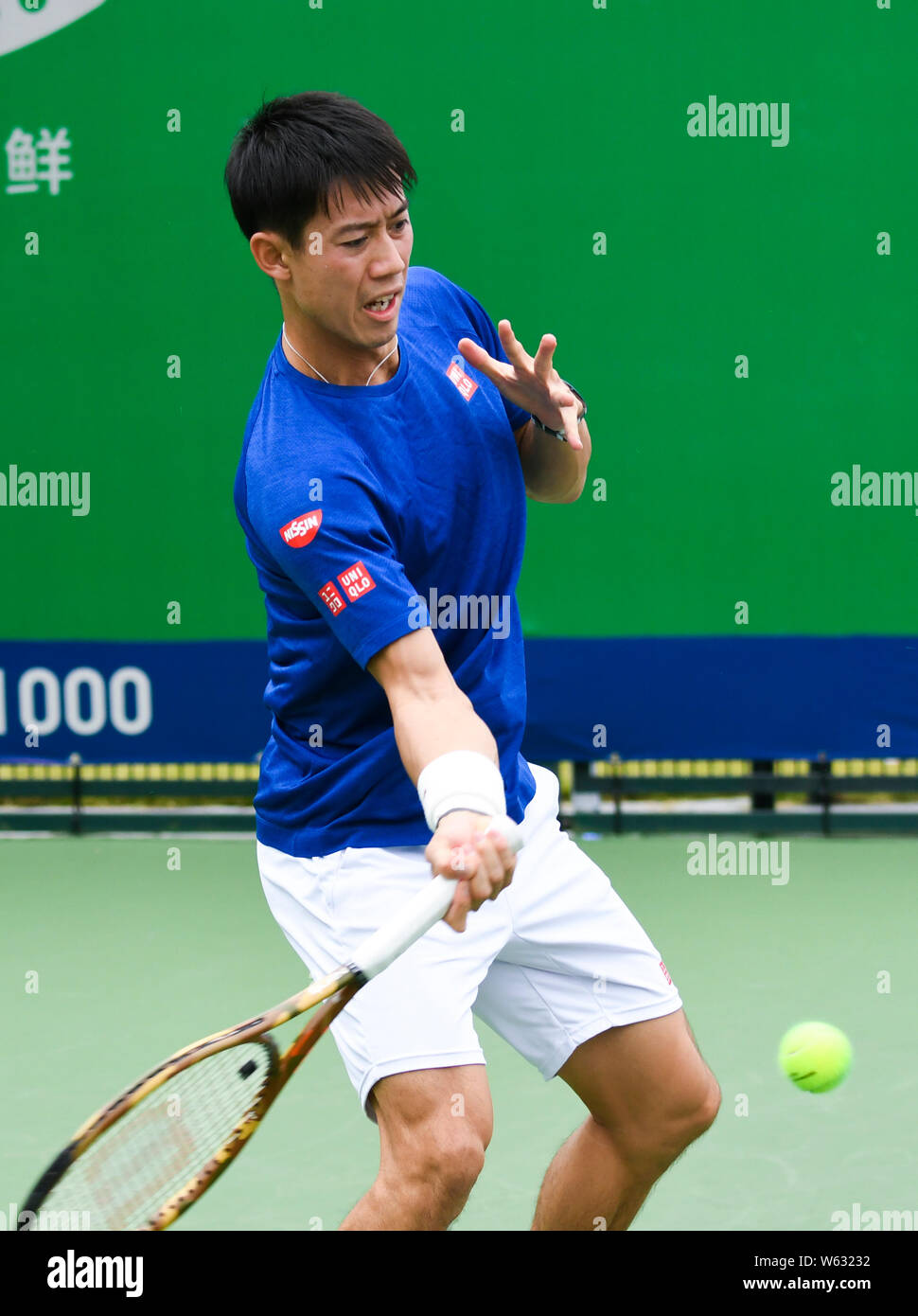 Japanese tennis player Kei Nishikori takes part in a training session ...