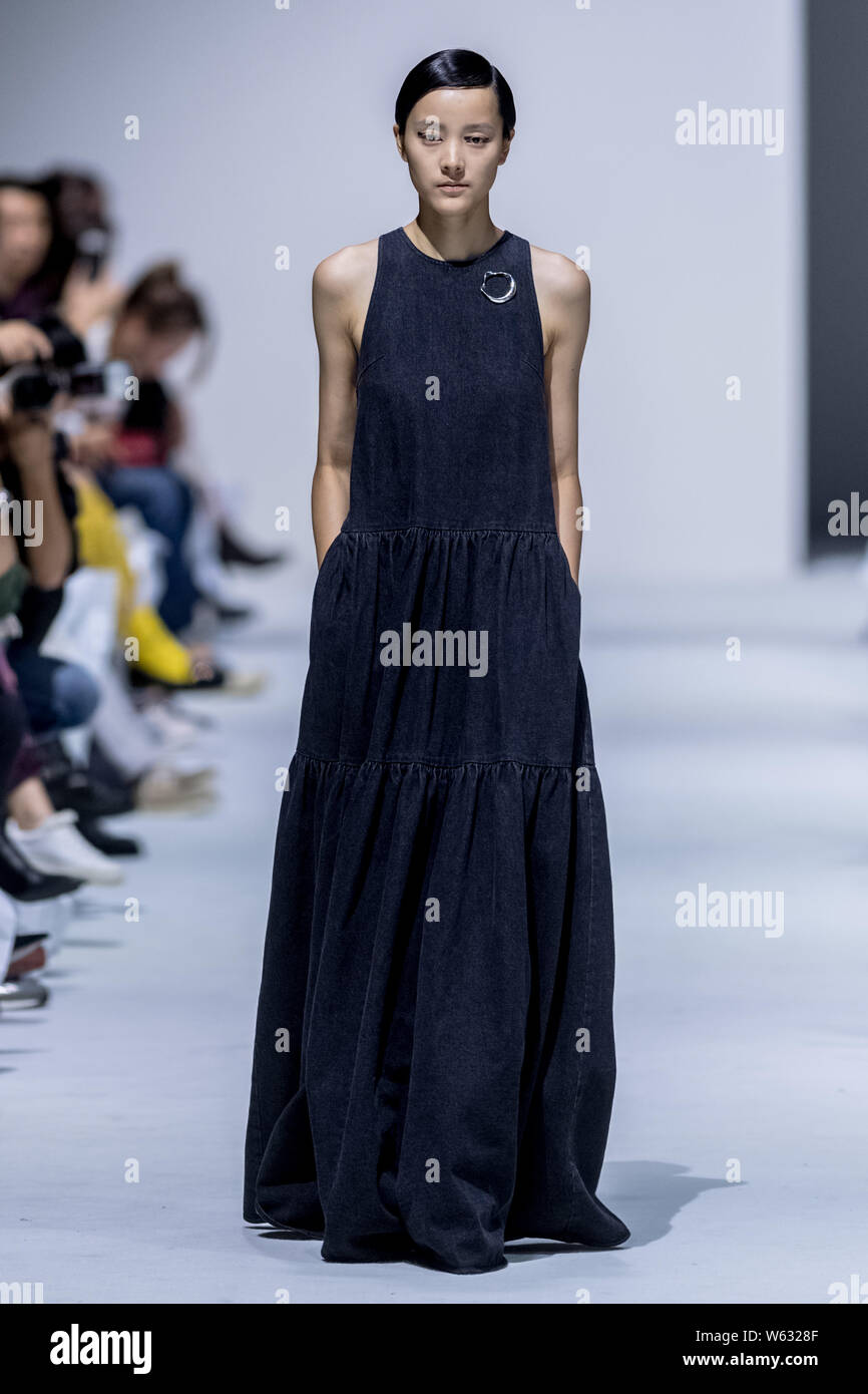 Chinese model Pei Bei displays a new creation at the fashion show of ...