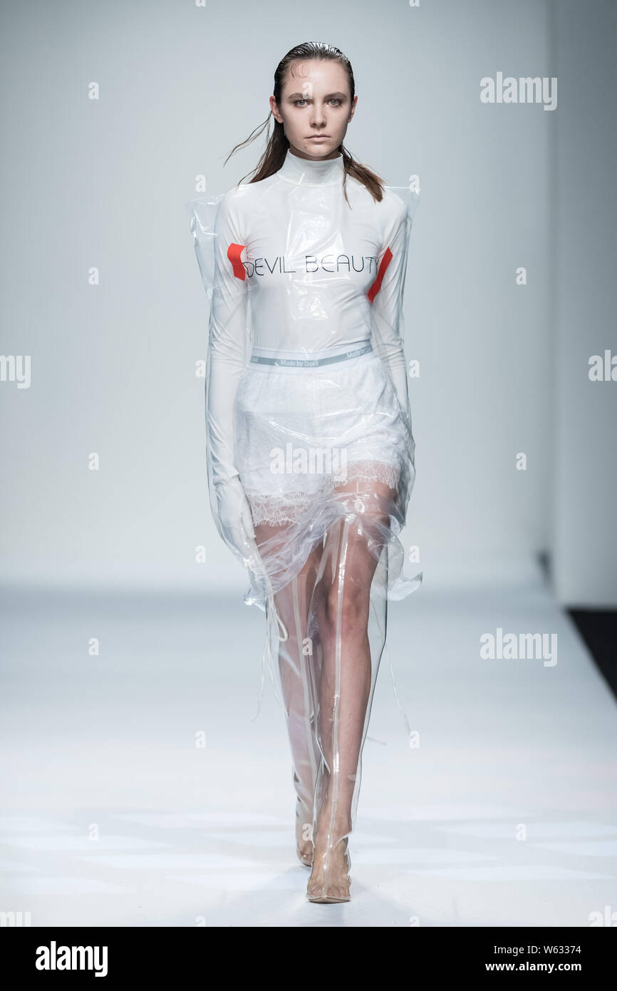 A model displays a new creation at the fashion show of DEVIL BEAUTY ...