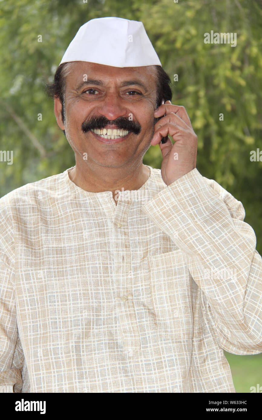 Indian old man talking on hi-res stock photography and images - Alamy