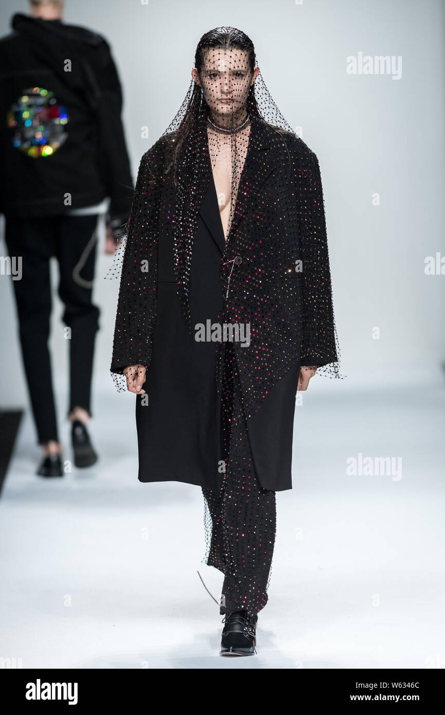 A model displays a new creation at the fashion show of DEVIL BEAUTY ...