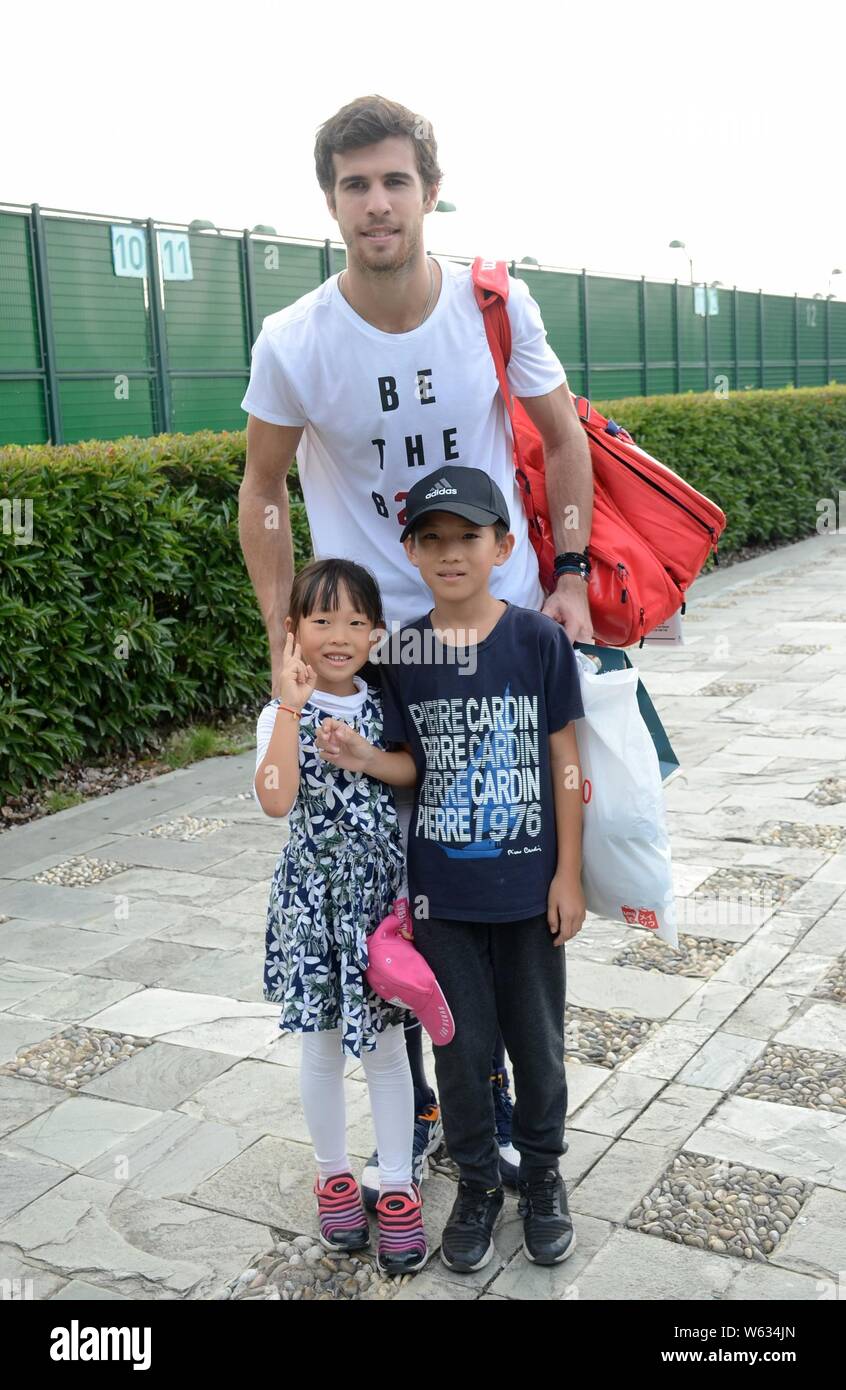 Russian tennis player Karen Khachanov is surrounded by fans after a ...
