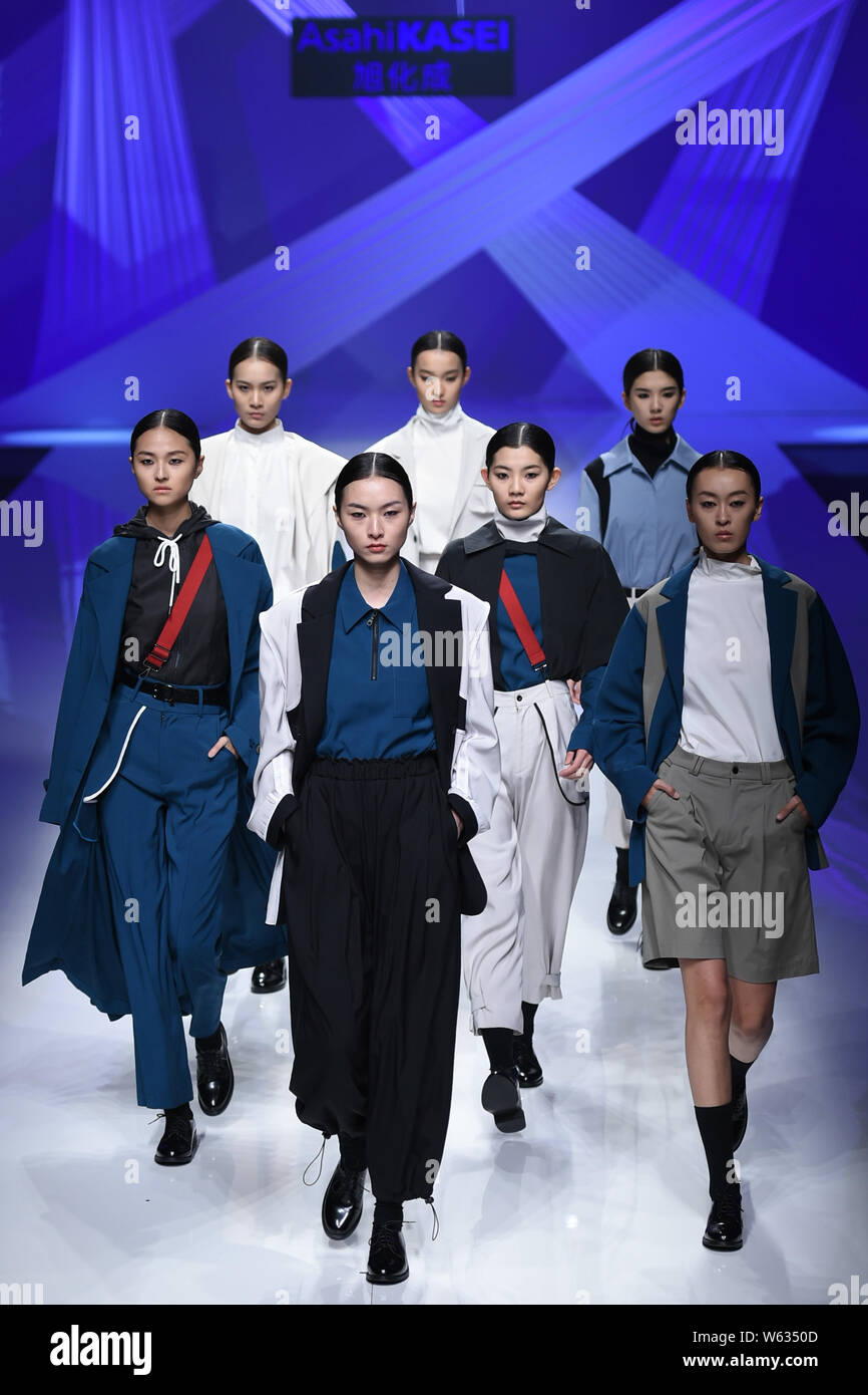 Models display new creations at the fashion show of Asahi Kasei Future ...