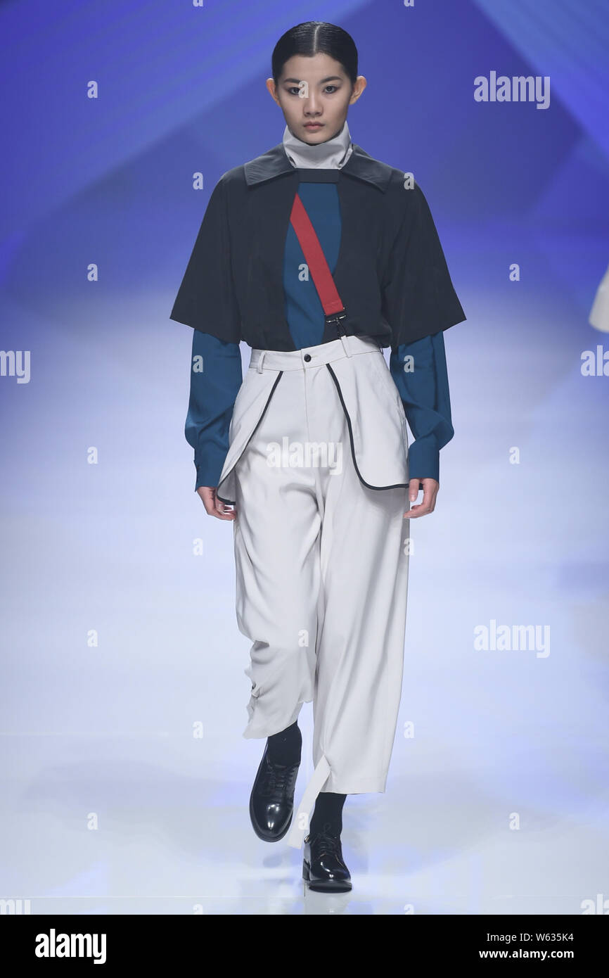 A model displays a new creation at the fashion show of Asahi Kasei Future Star Innovation Award ...