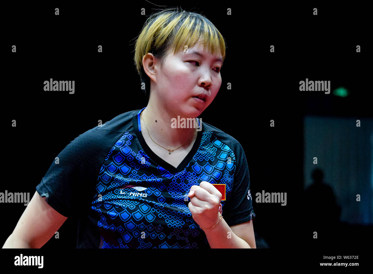 Zhu Yuling of China reacts after scoring against Cheng I-Ching of ...