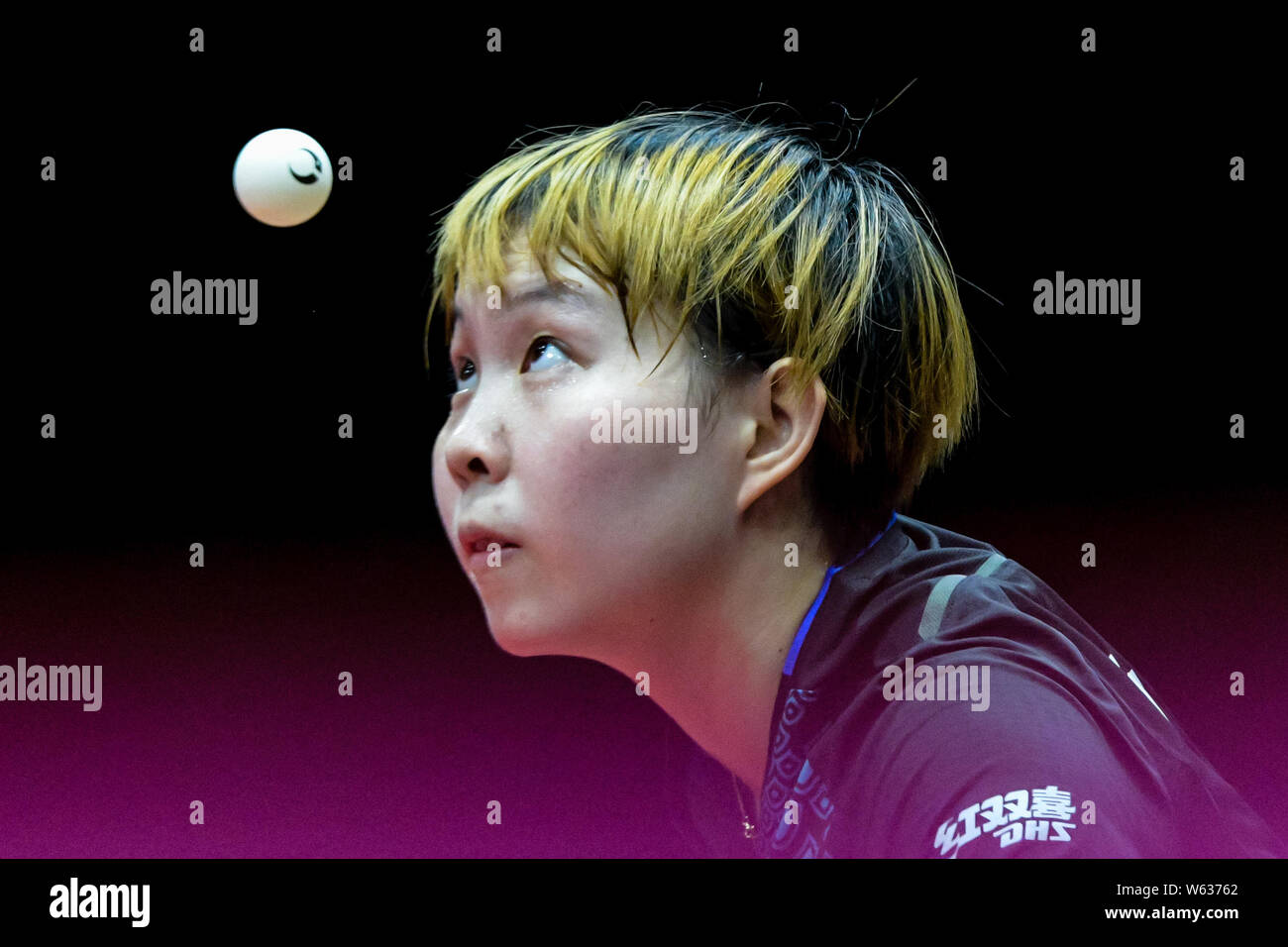 Zhu Yuling of China serves against Cheng I-Ching of Chinese Taipei in ...