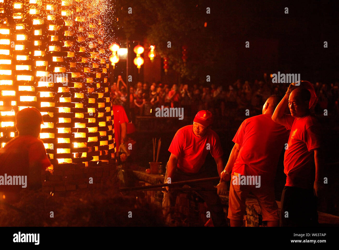 A pagoda made of tile bricks is on fire to mark the Mid-Autumn Festival ...