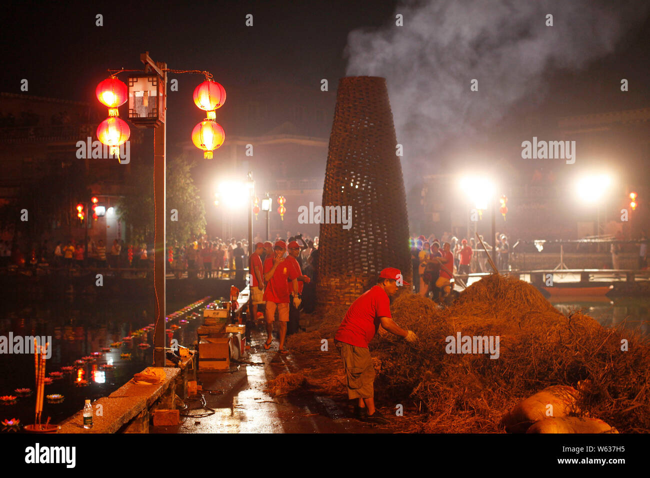 A pagoda made of tile bricks is on fire to mark the Mid-Autumn Festival ...