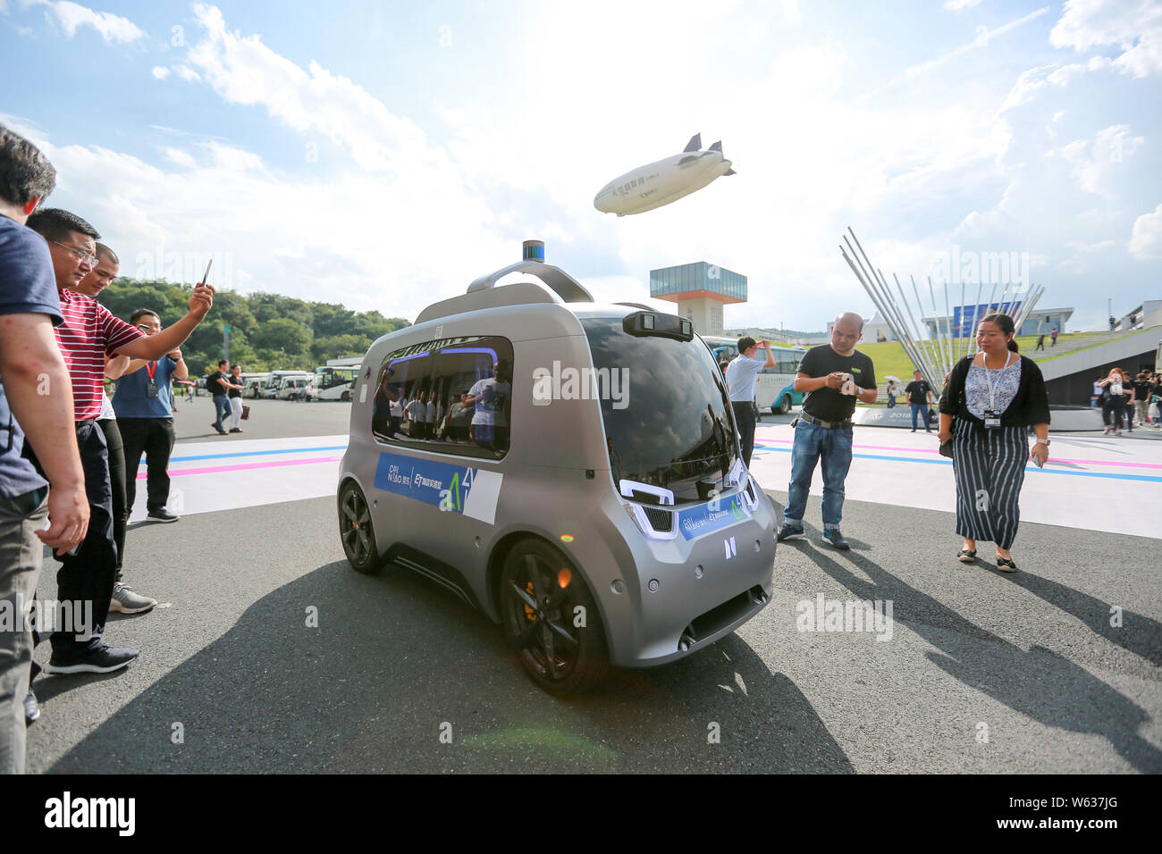 A driverless delivery vehicle developed by the logistics arm Cainiao ...