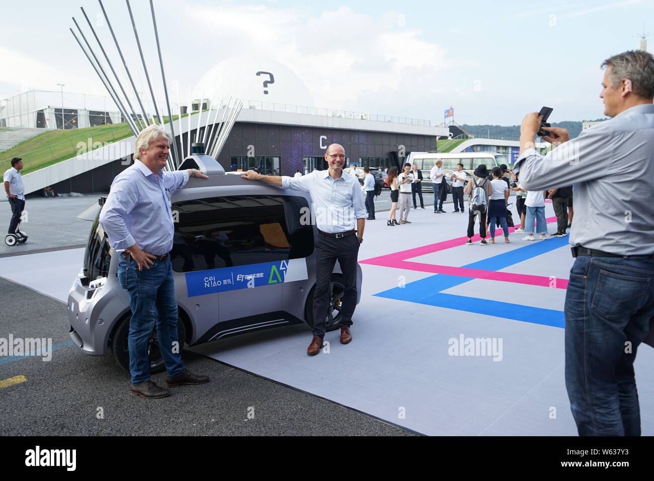 A driverless delivery vehicle developed by the logistics arm Cainiao ...