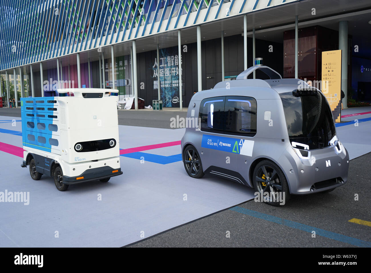Two driverless delivery vehicles developed by the logistics arm Cainiao ...