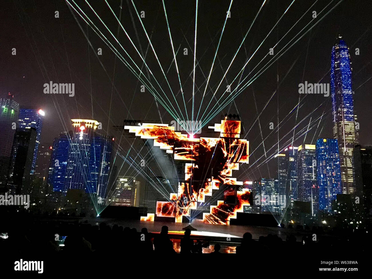 Lights are illuminated during a light show to celebrate the 40th ...