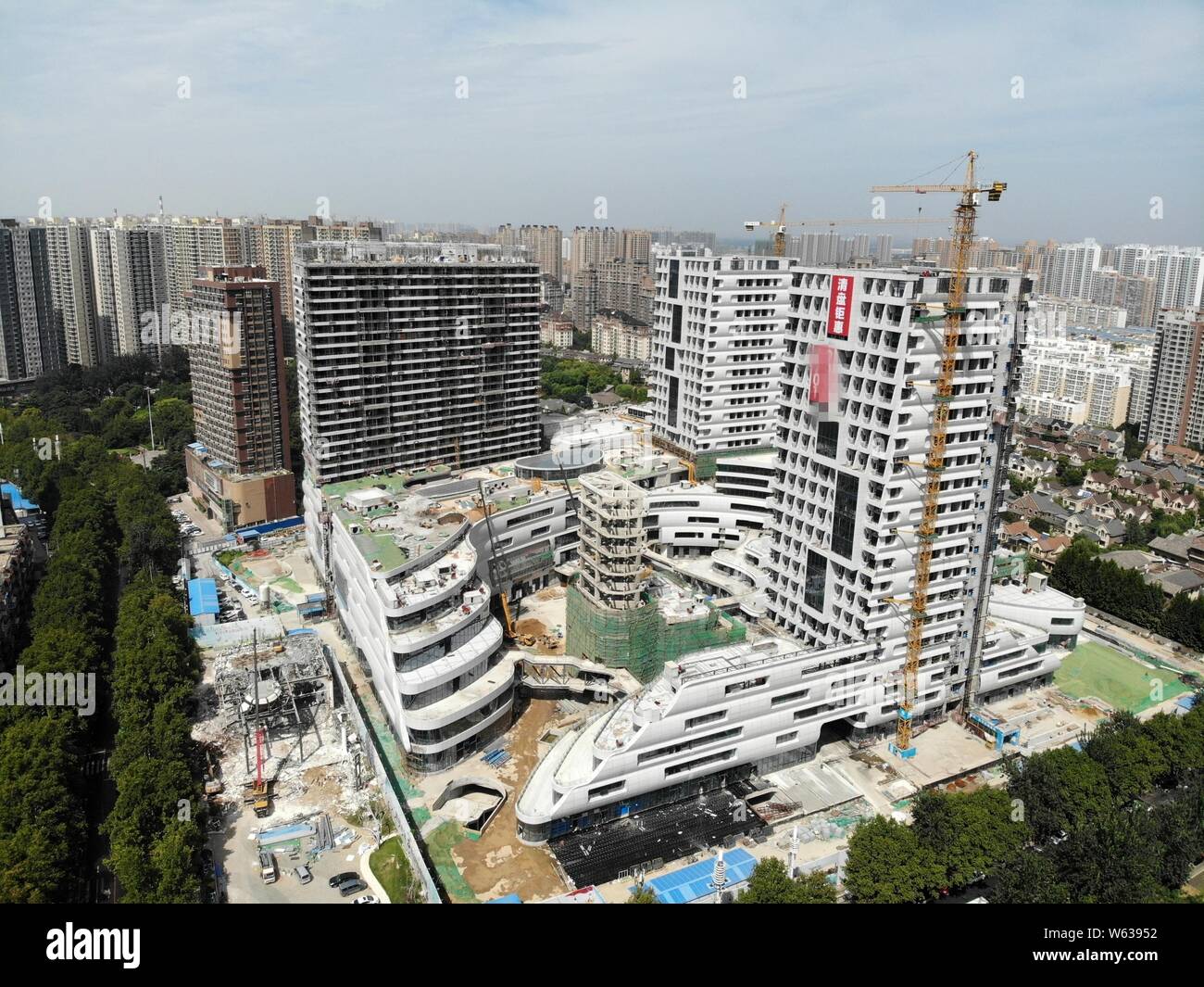 Aerial view of a building under construction featuring the shape of a ...