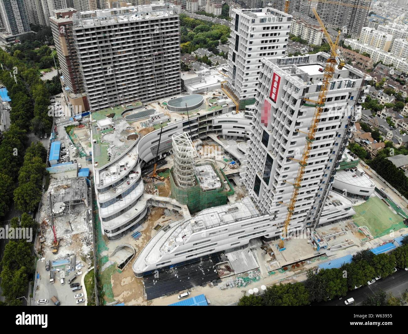Aerial view of a building under construction featuring the shape of a ...