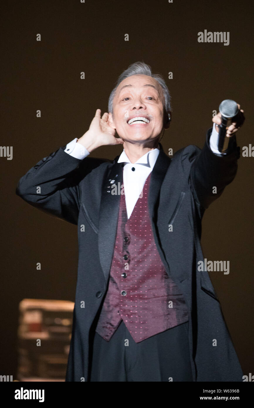 Japanese singer-songwriter Tanimura Shinji sings at a concert in ...