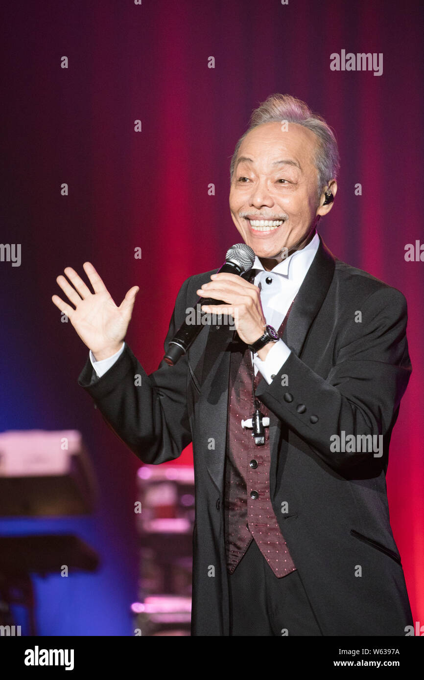 Japanese singer-songwriter Tanimura Shinji sings at a concert in ...