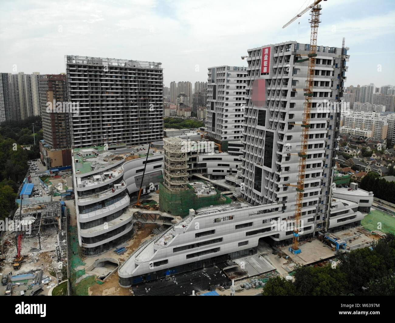 Aerial view of a building under construction featuring the shape of a ...