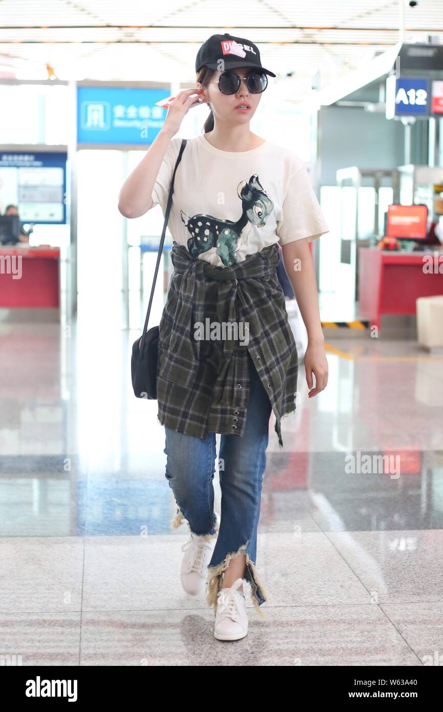 Chinese singer Jane Zhang or Zhang Liangying arrives at the Beijing ...