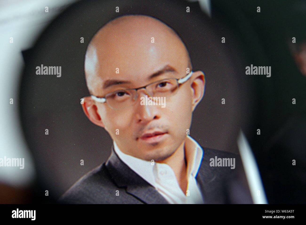 --FILE--A Chinese netizen browses the website of China Renaissance on ...