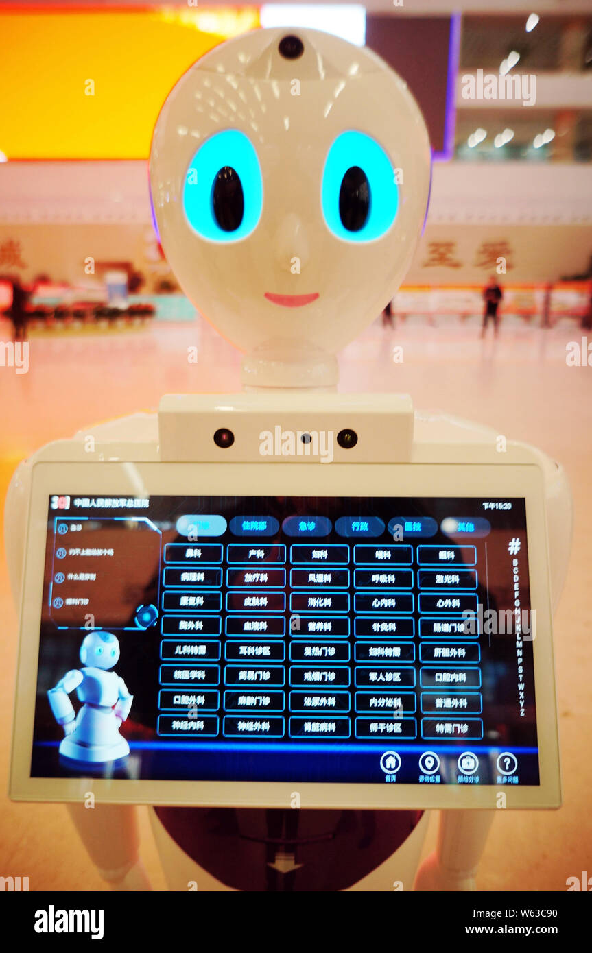 A robot receptionist serves patients in the outpatient hall at Chinese ...