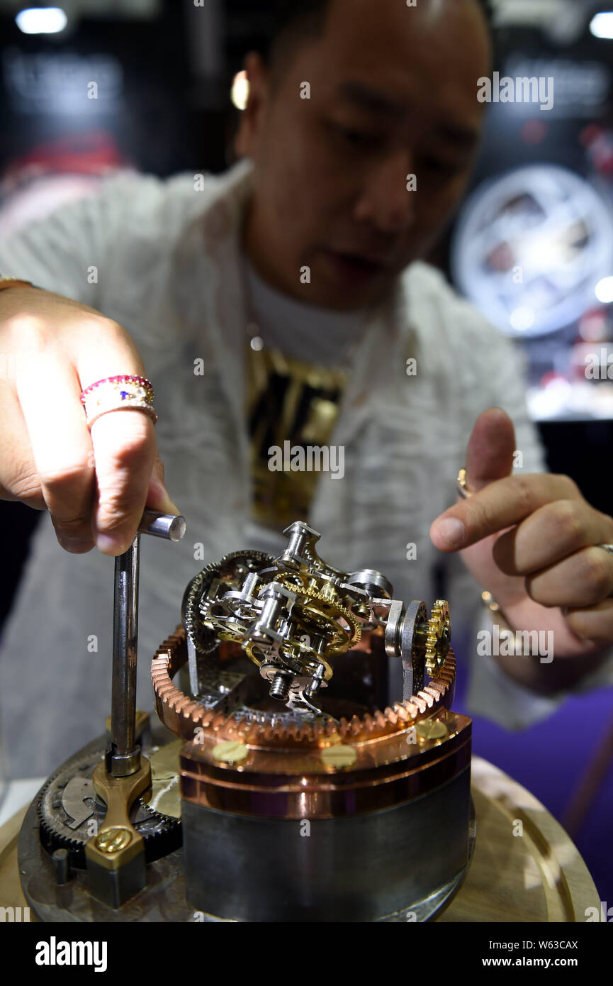 Clock worker exhibition hi-res stock photography and images - Alamy