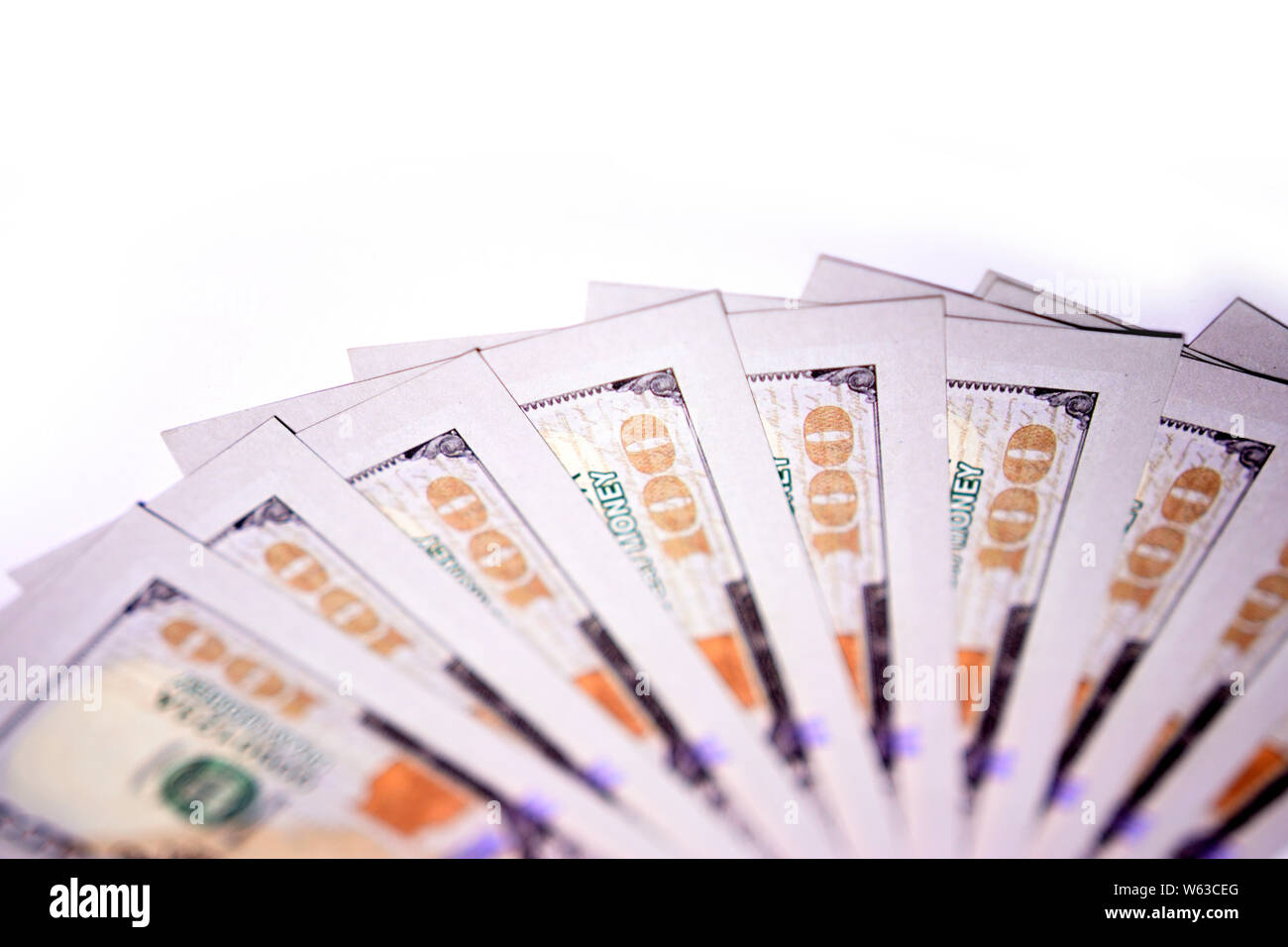 100 US dollar paper money isolated on white background Stock Photo - Alamy