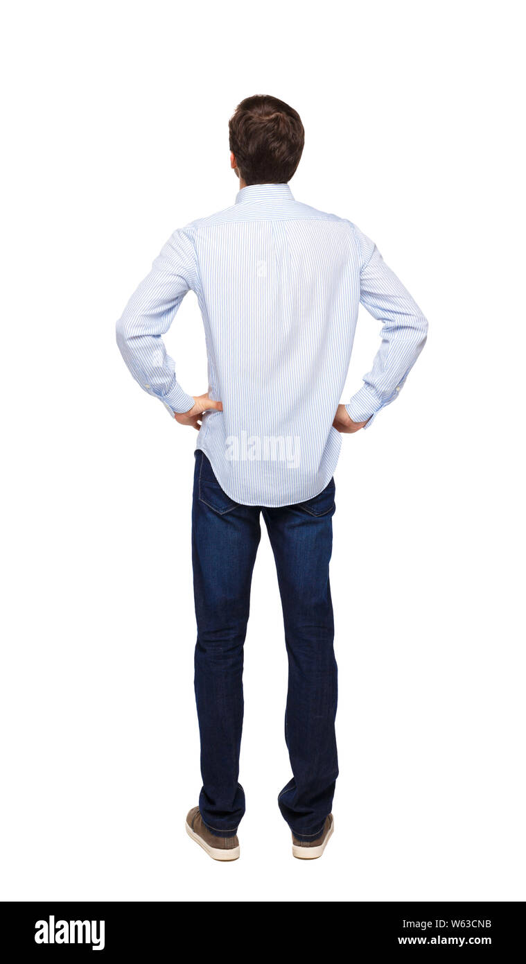 Back view of man in dark jeans. Standing young guy. Rear view people ...
