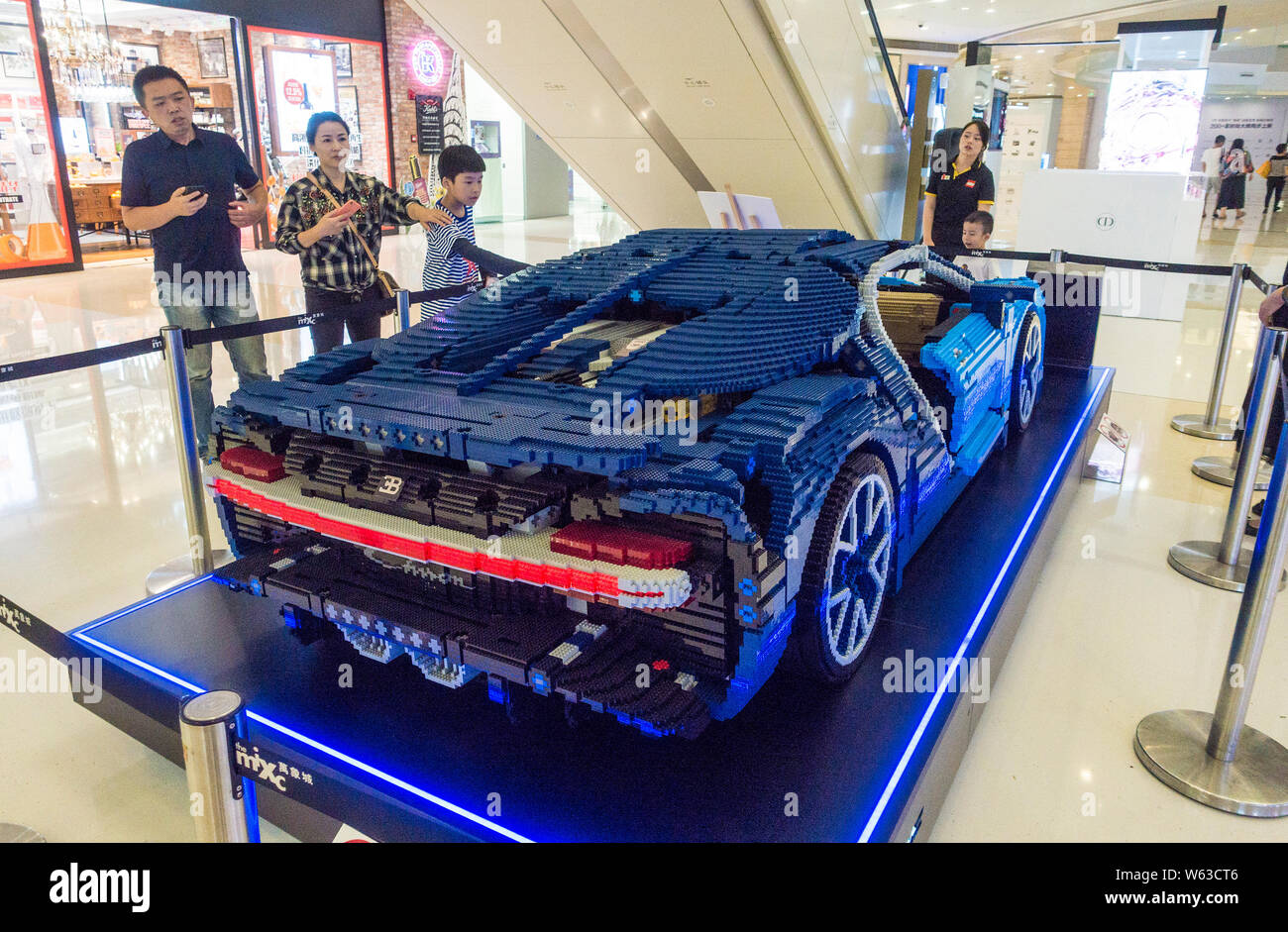 A Bugatti sports car made of 238,762 Lego bricks is on display at a ...