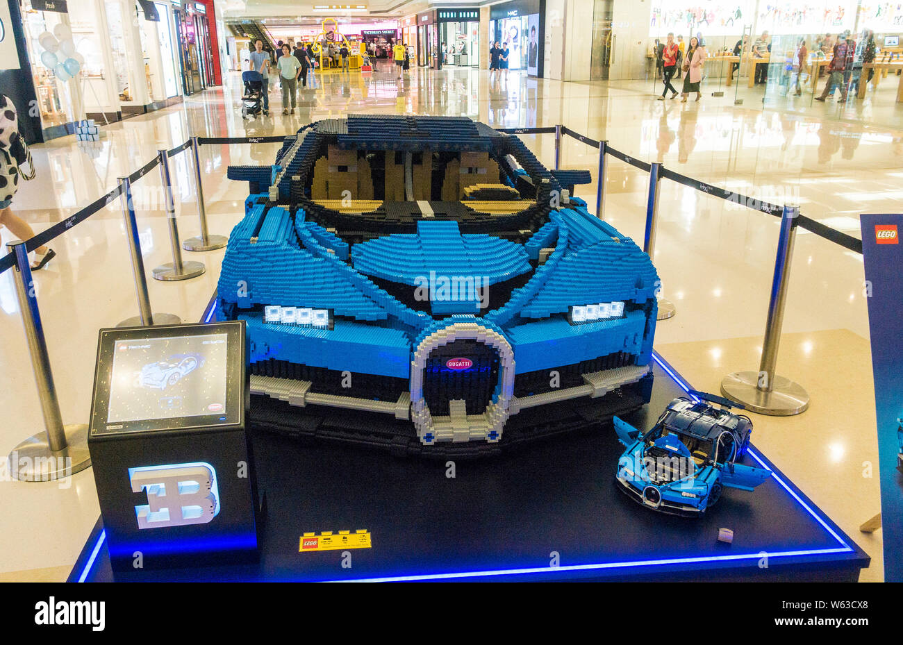 A Bugatti sports car made of 238,762 Lego bricks is on display at a ...