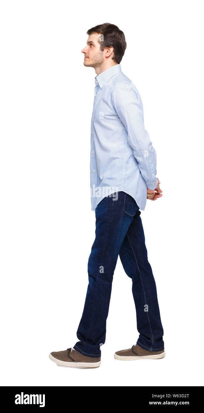 Side view of going handsome man. walking young guy . Rear view people ...