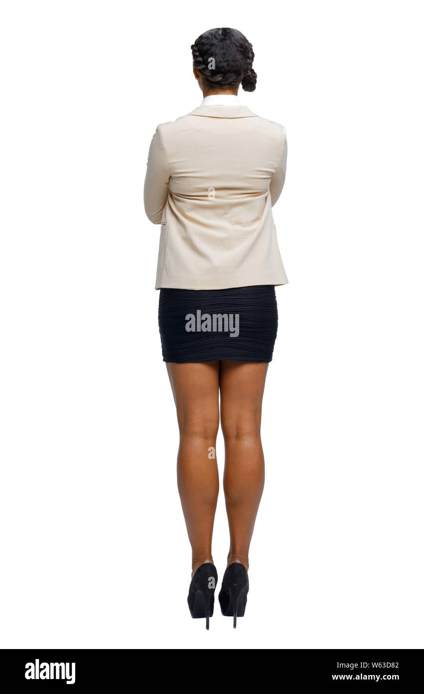 Back view of an African-American woman in suit. girl watching. Rear ...