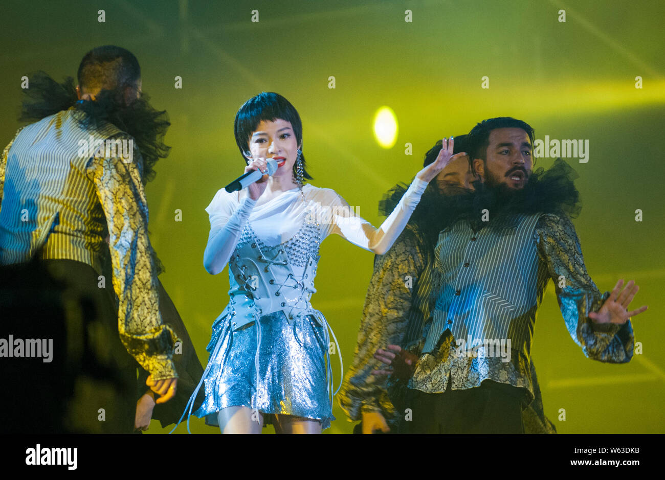 Taiwanese singer and actress Angela Chang, center, performs during her ...
