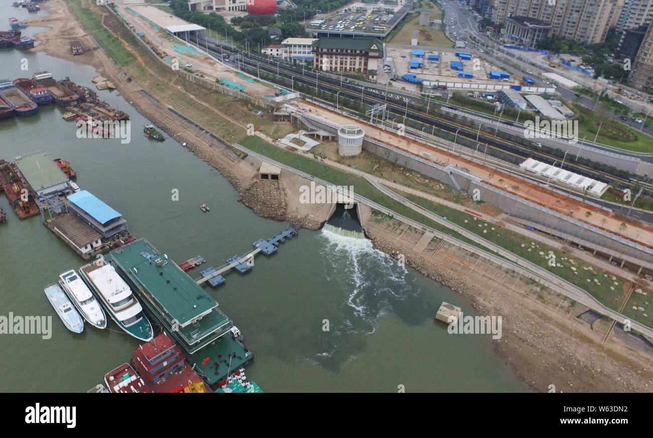 Aerial view of sewage released from a water gate flowing into the ...