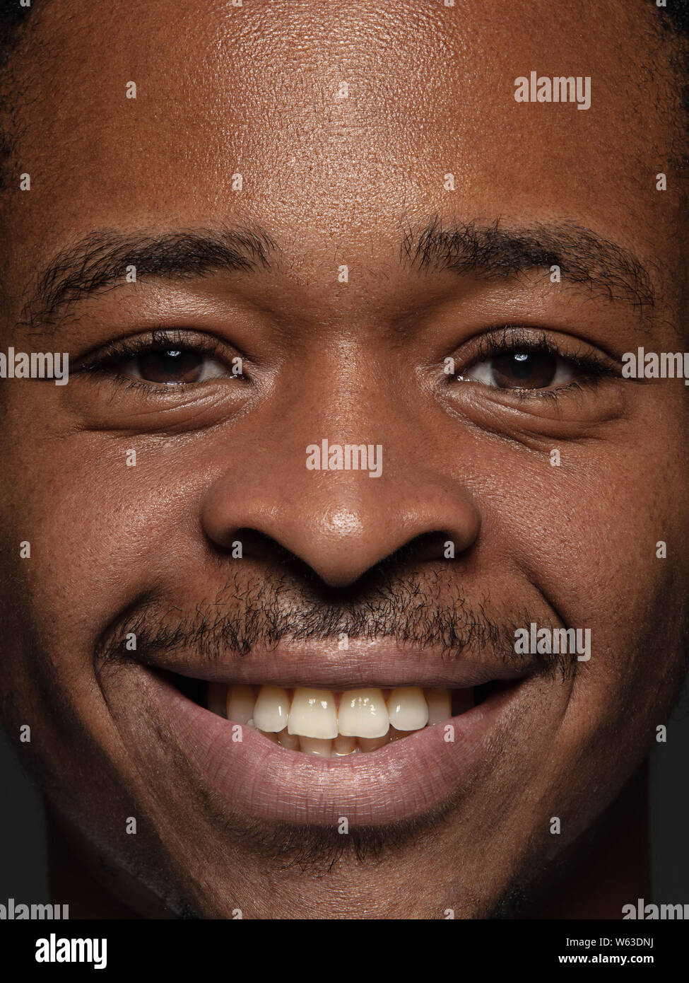 Close up portrait of young and emotional african-american man. Highly ...