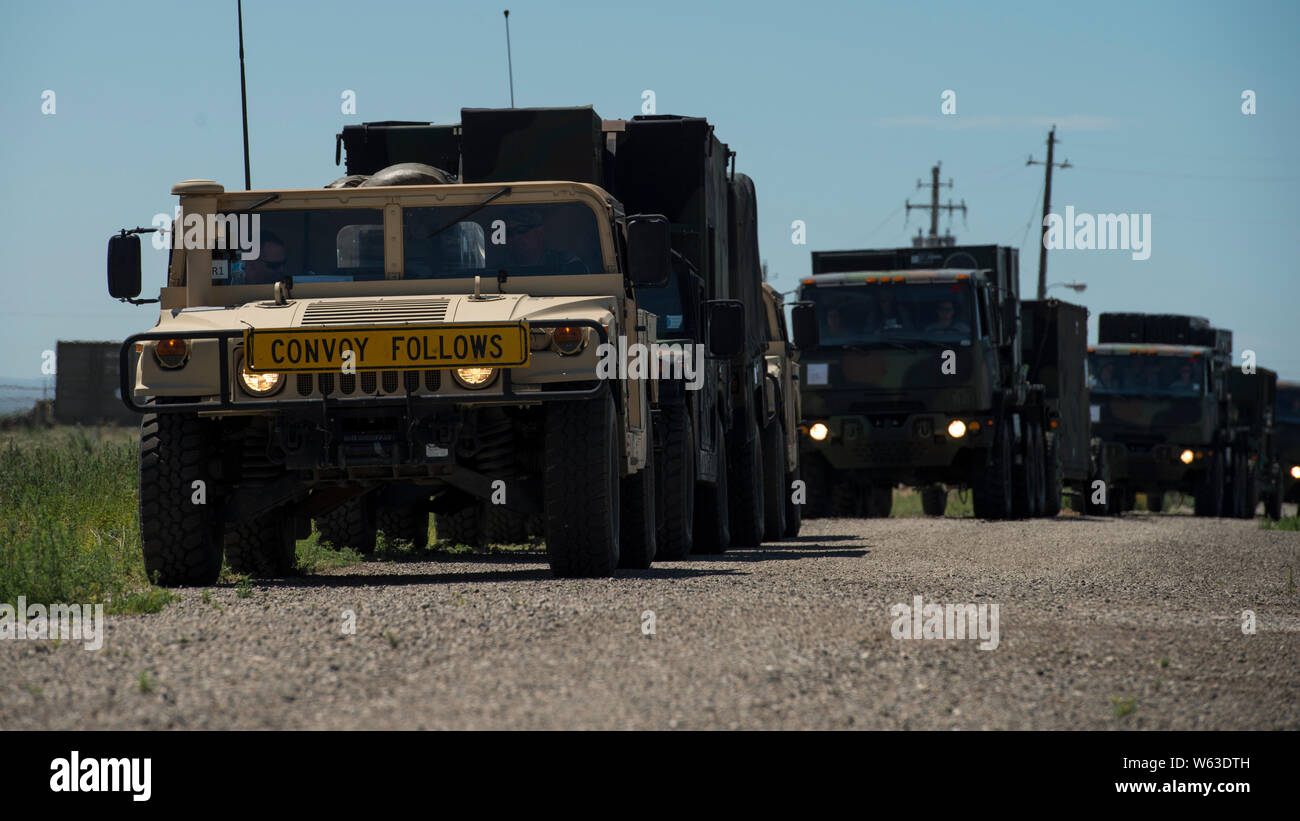 A U.S. Air Force convoy of 5-ton trucks from the 726th Air Control ...