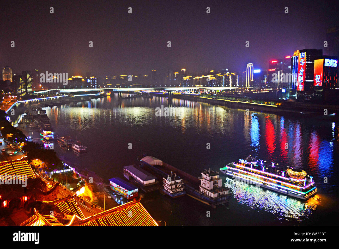 Night view of skyscrapers and high-rise buildings along the Yangtze ...