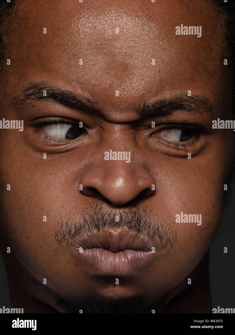Man face close up agressive hi-res stock photography and images - Alamy