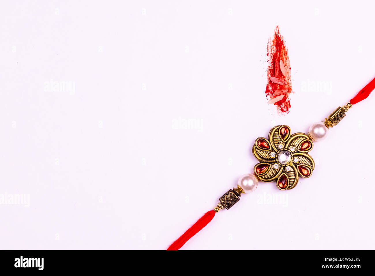 Raksha Bandhan - Beautiful Rakhi with creative kumkum and rice grain ...