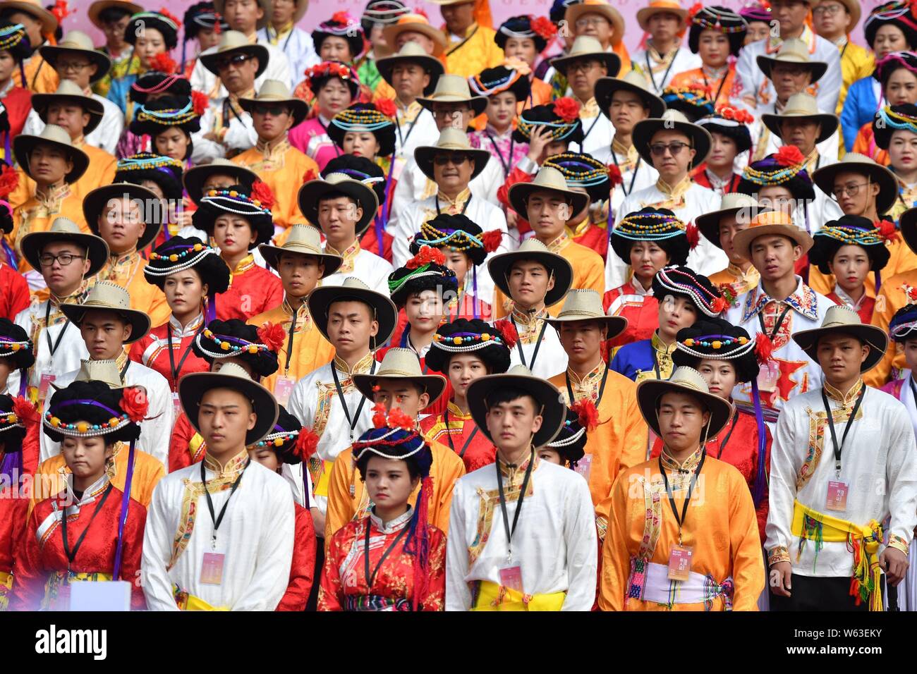 66 couples dressed in Mosuo people's traditional clothing take part in ...