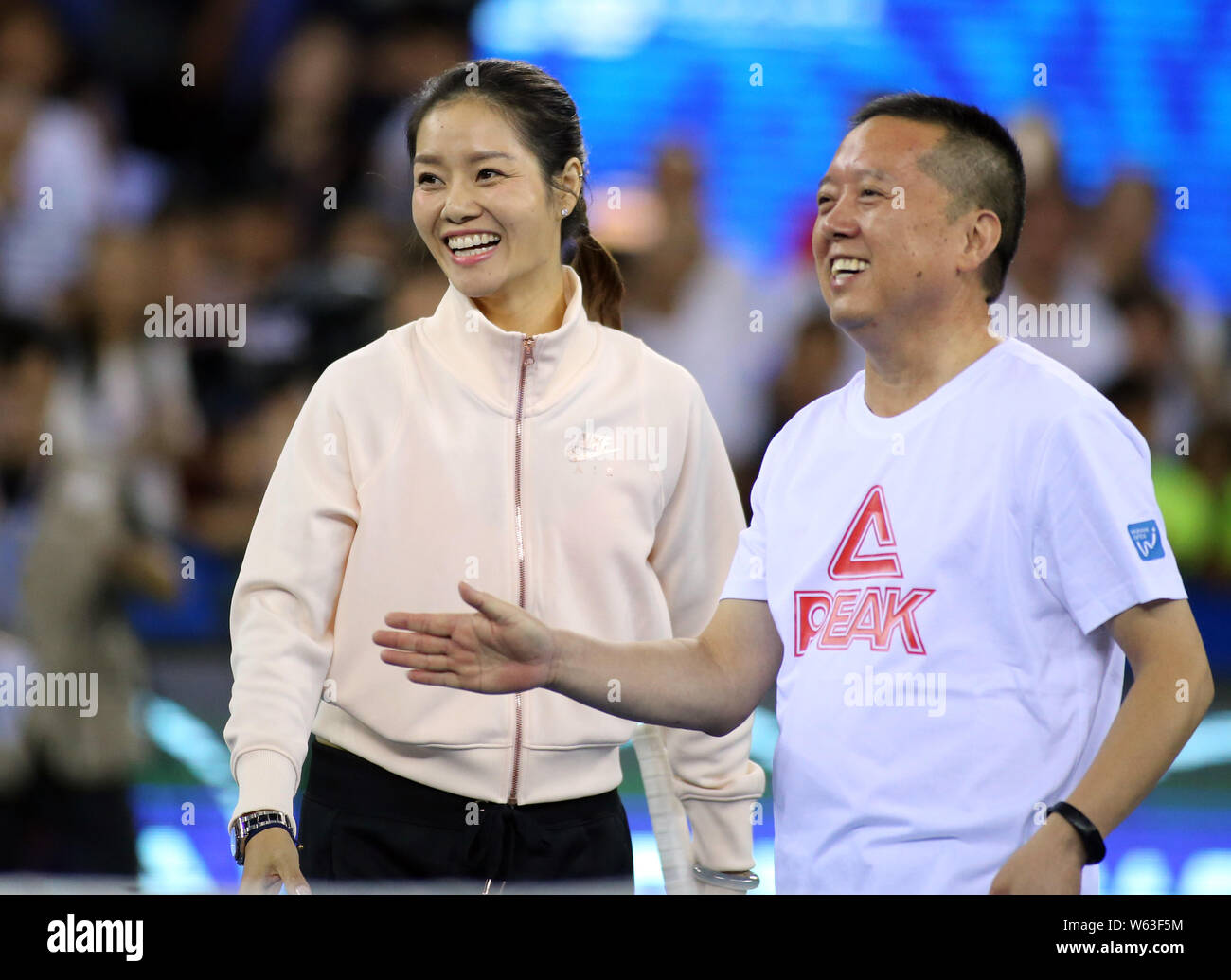 Retired Chinese tennis star Li Na is pictured at a first round match ...