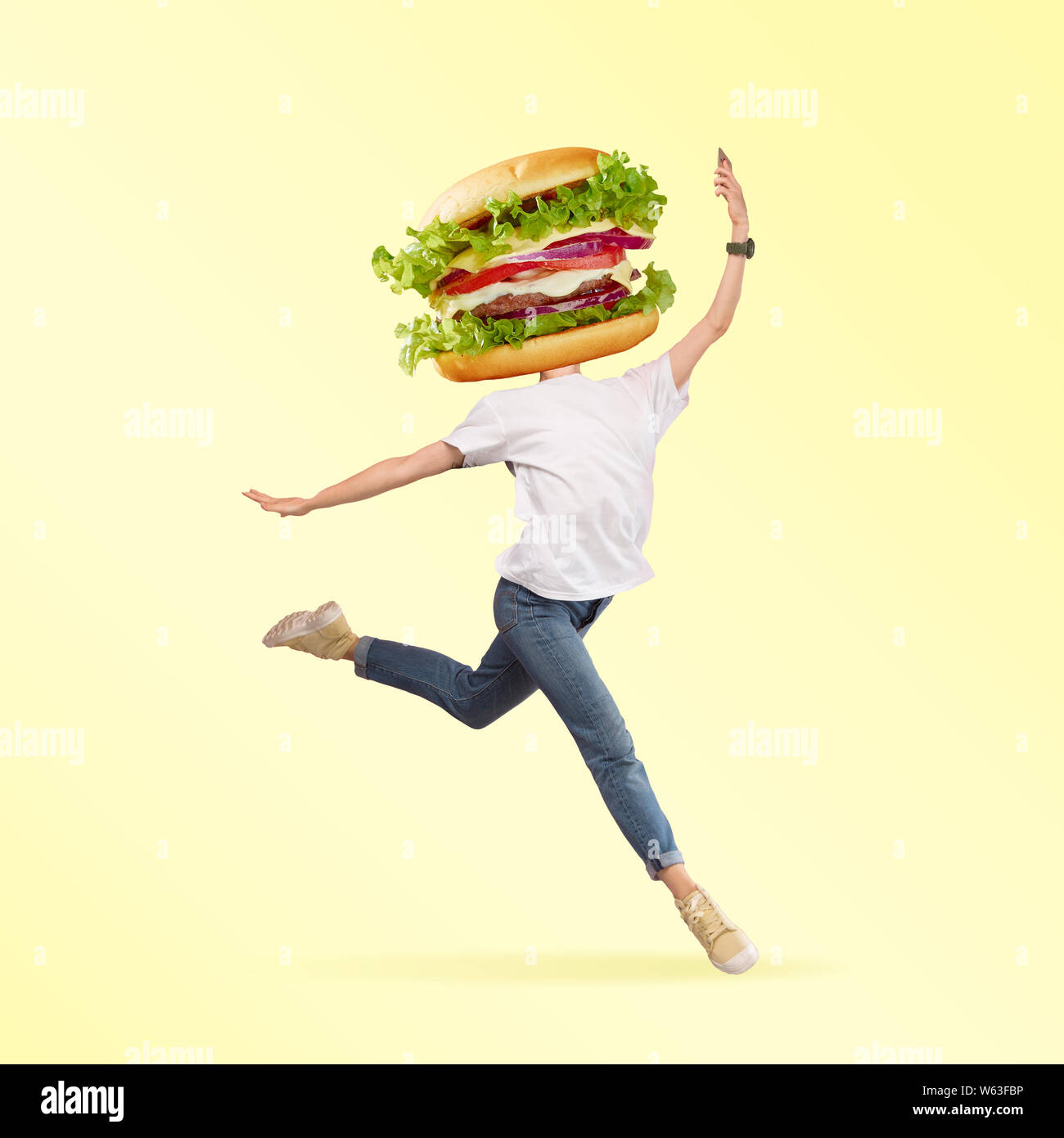 Fast food. Running human body headed by the burger on yellow background ...