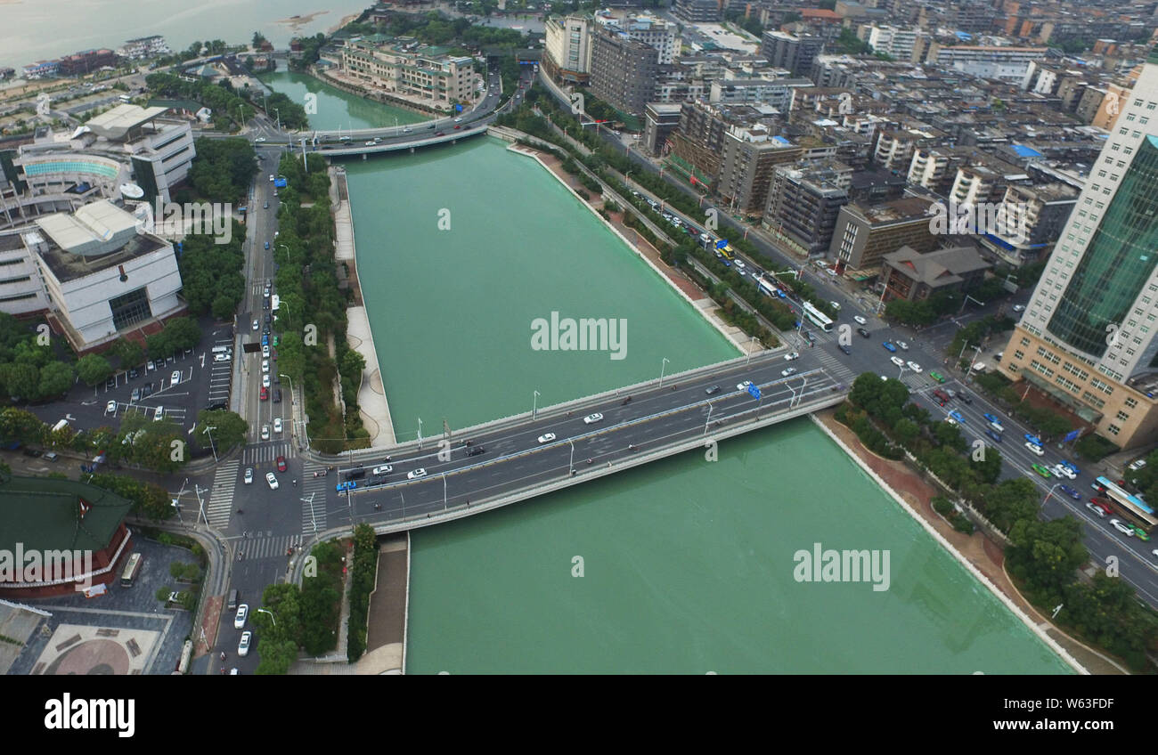 Aerial view of a river covered with blue-green algae in Nanchang city ...