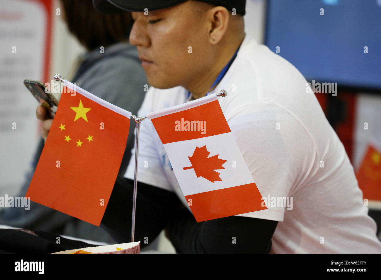--FILE--Chinese and Canadian national flags are seen during an ...